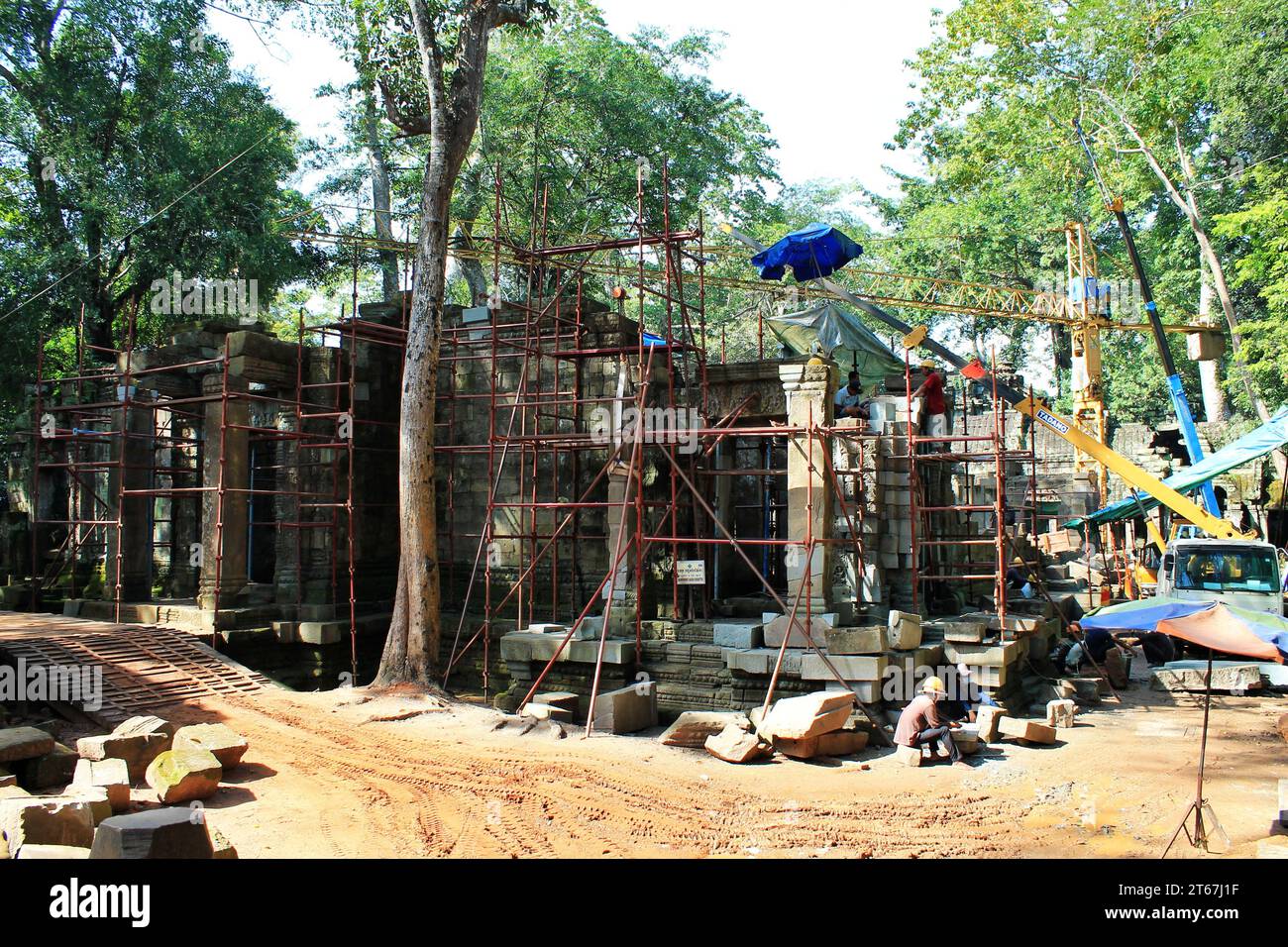 Reconstruction efforts continue nonstop among the ruins in the Angkor ...
