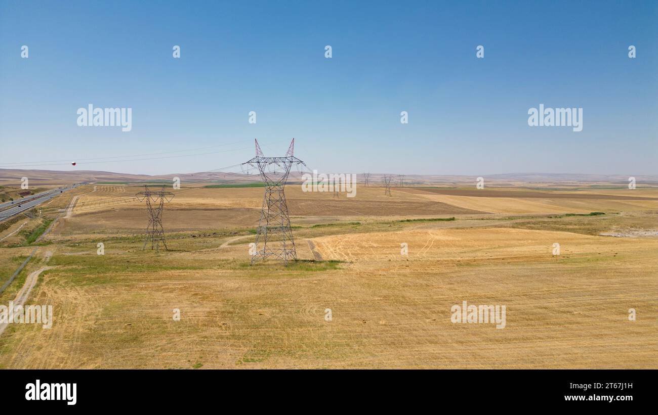 Electric transmission poles in rural area. Electricity transmission ...