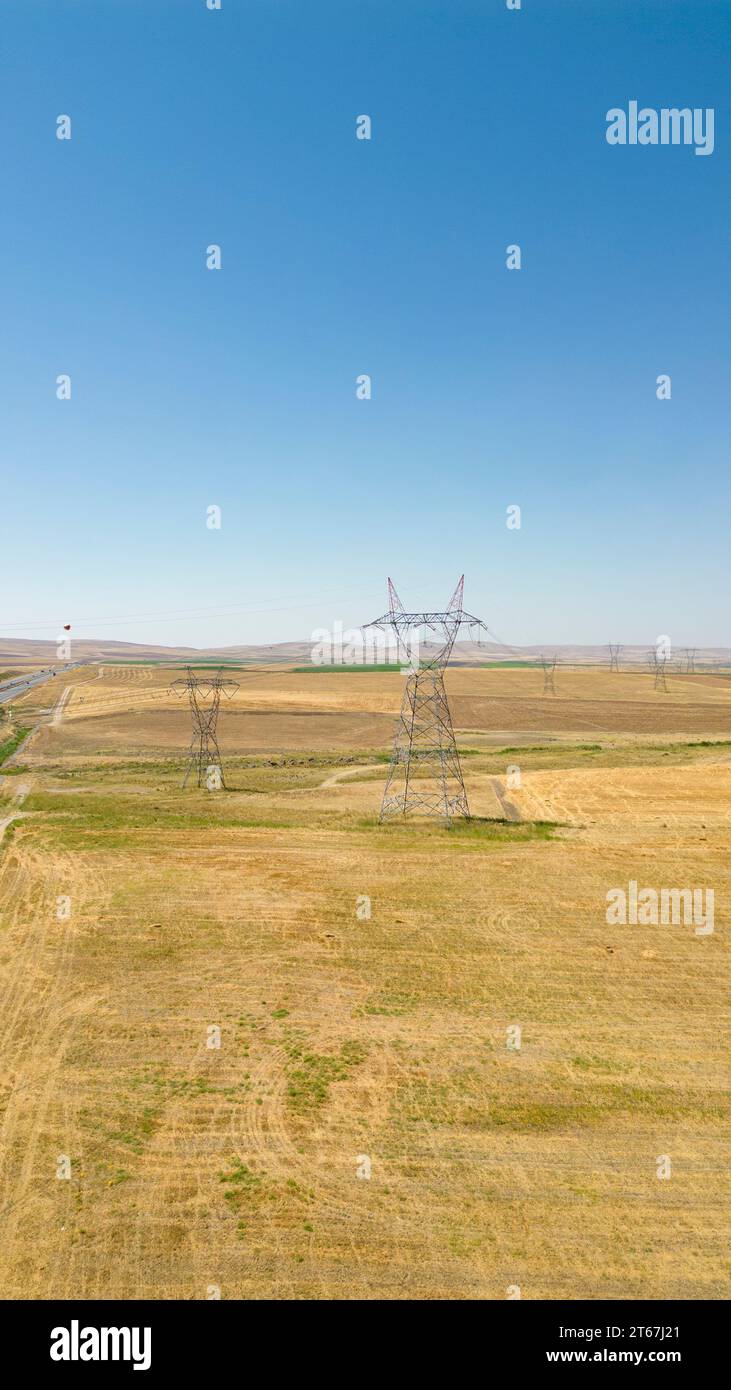 Electric transmission poles in rural area. Electricity transmission ...