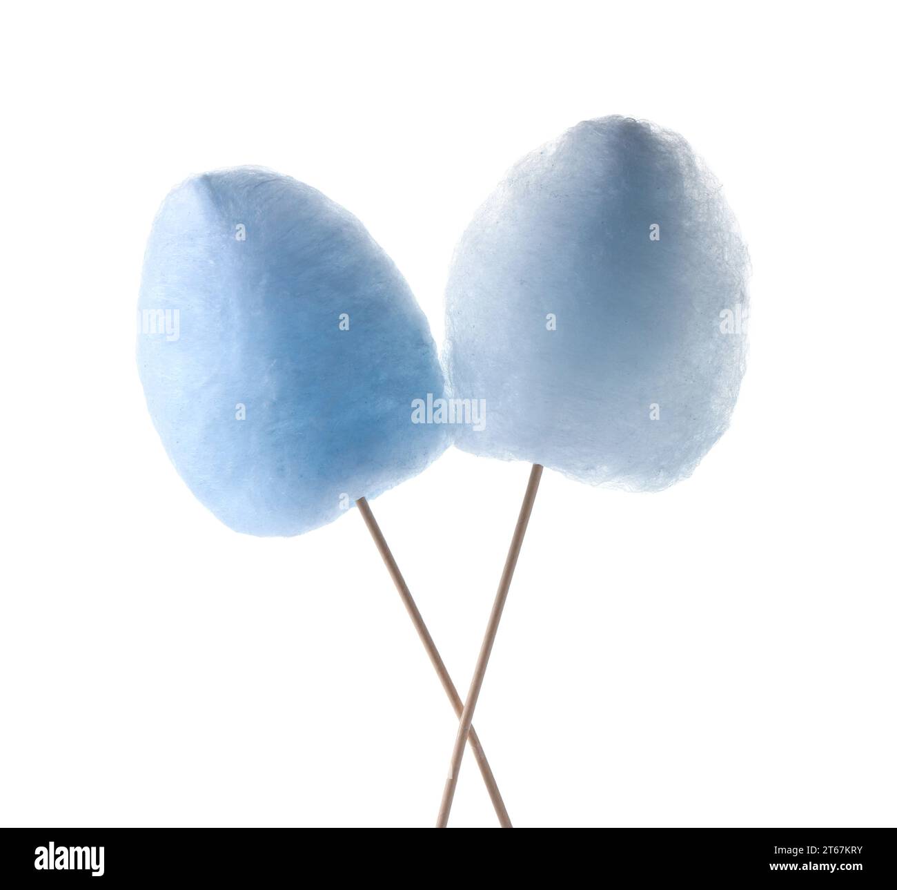 Sticks with yummy cotton candy isolated on white Stock Photo - Alamy