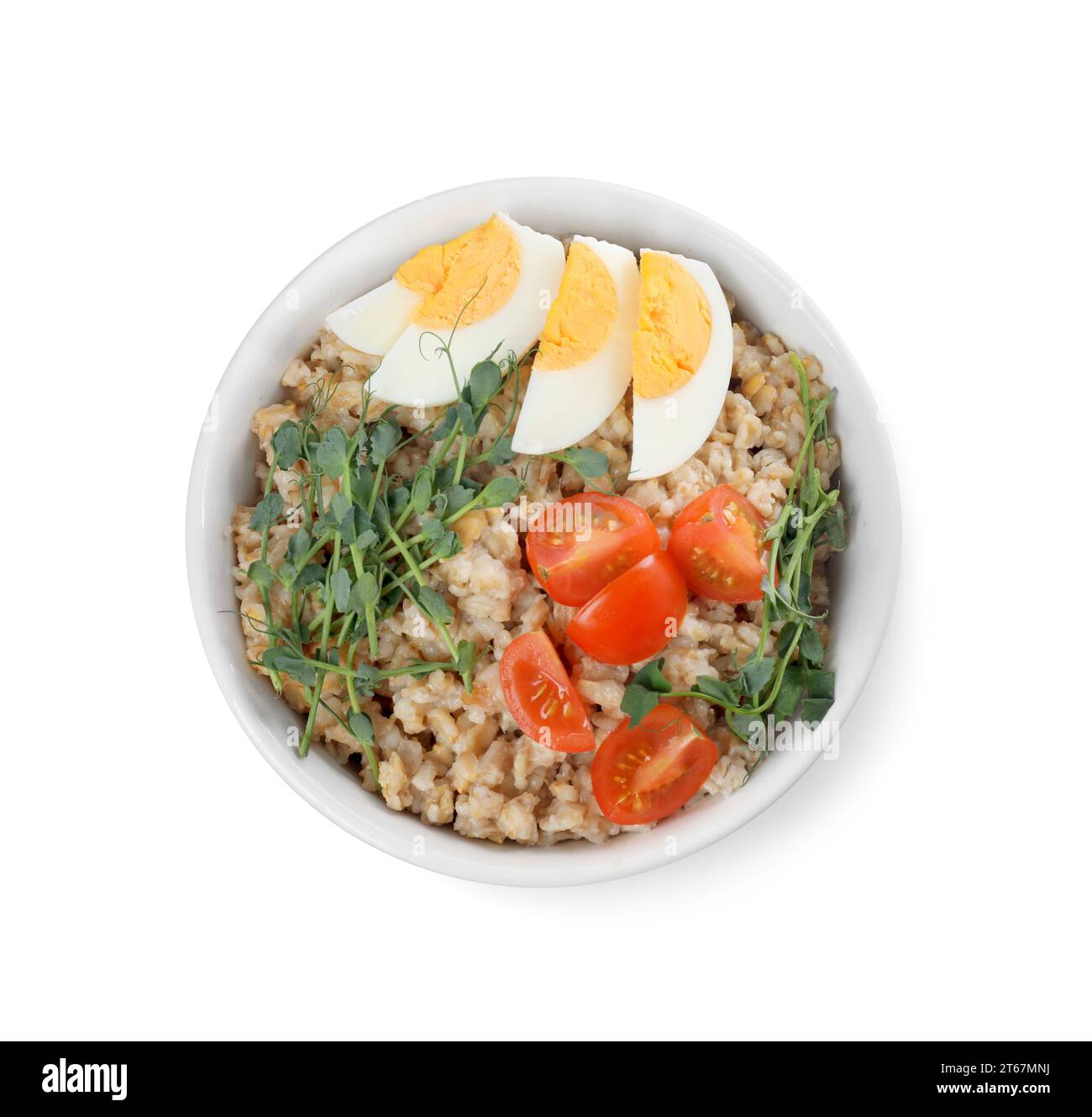 Tasty boiled oatmeal with egg and tomatoes isolated on white, top view ...