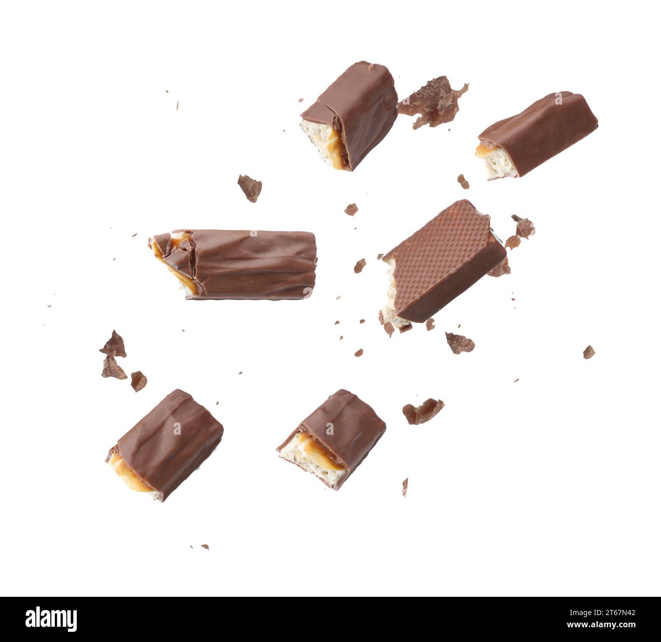 Pieces of chocolate bars falling on white background Stock Photo - Alamy