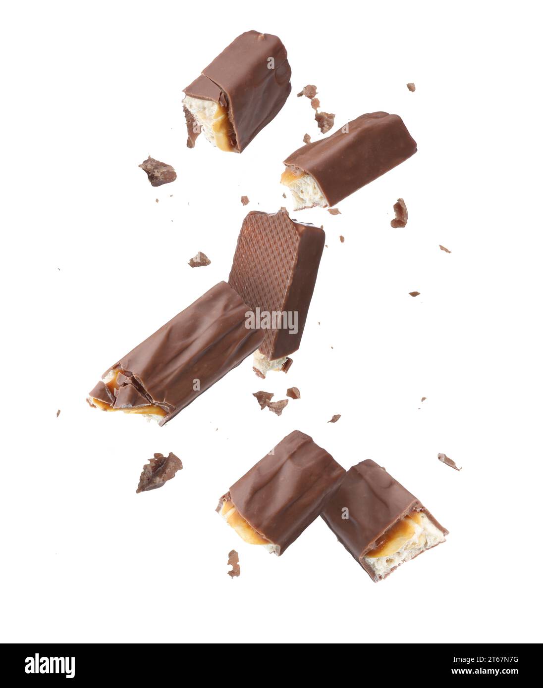 Pieces of chocolate bars falling on white background Stock Photo - Alamy