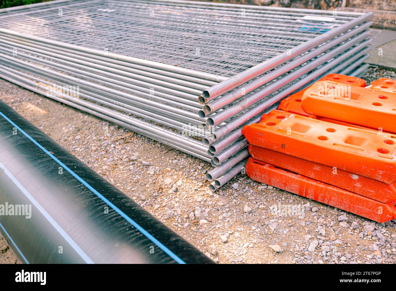 Pile, heap of galvanized parts for temporary metal fence panels are ...