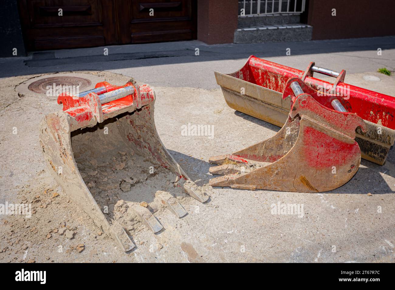 Set of used several different types of excavator's buckets, various ...