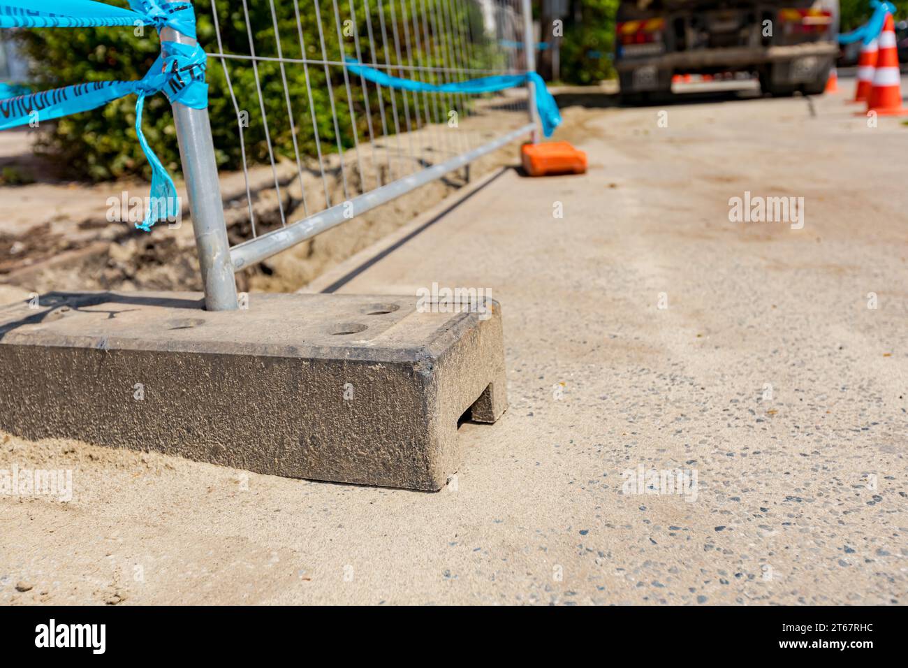 Hollow plastic fence foot is for stability of temporary metal wire ...