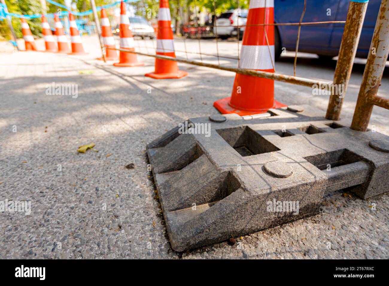 Barricade installed in front of building site next to city road with ...