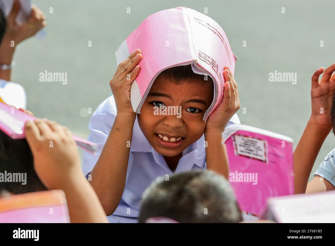 Head during earthquake drill hi-res stock photography and images - Alamy