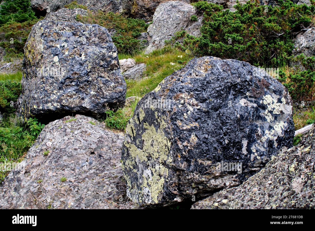 Obsidian is a volcanic glass. This photo was taken in Obsidian Cliff ...