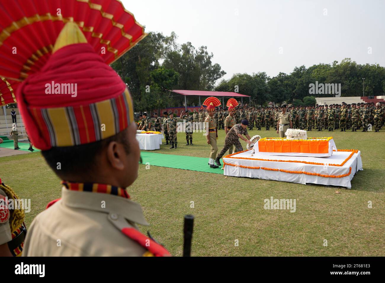 Indian Border Security Force (BSF) soldiers pay tribute to their ...