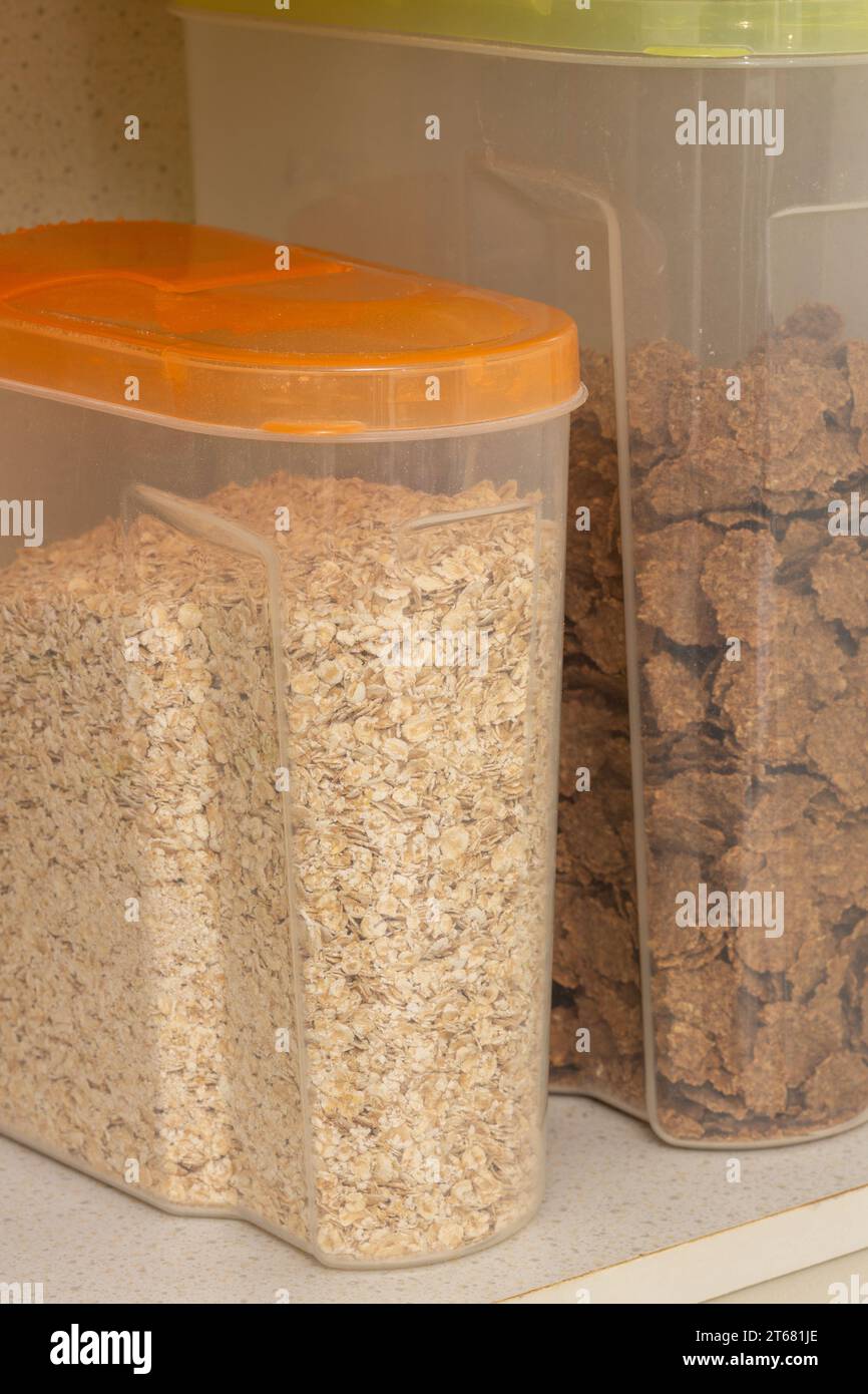 Porridge oats and Bran flakes in plastic storage containers Stock Photo ...