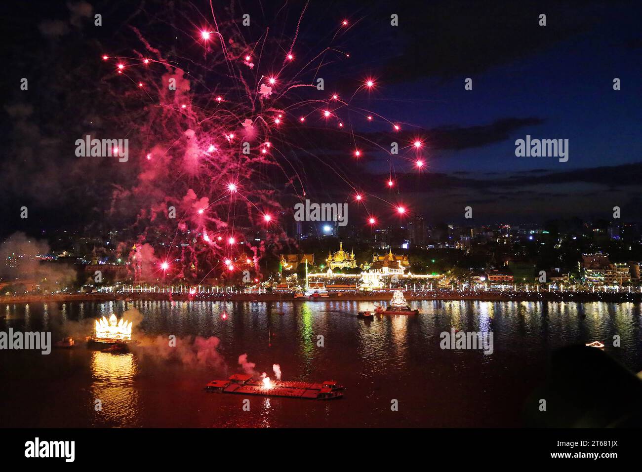 Aerial view of fireworks exploding over Tonle Sap River, illuminated ...