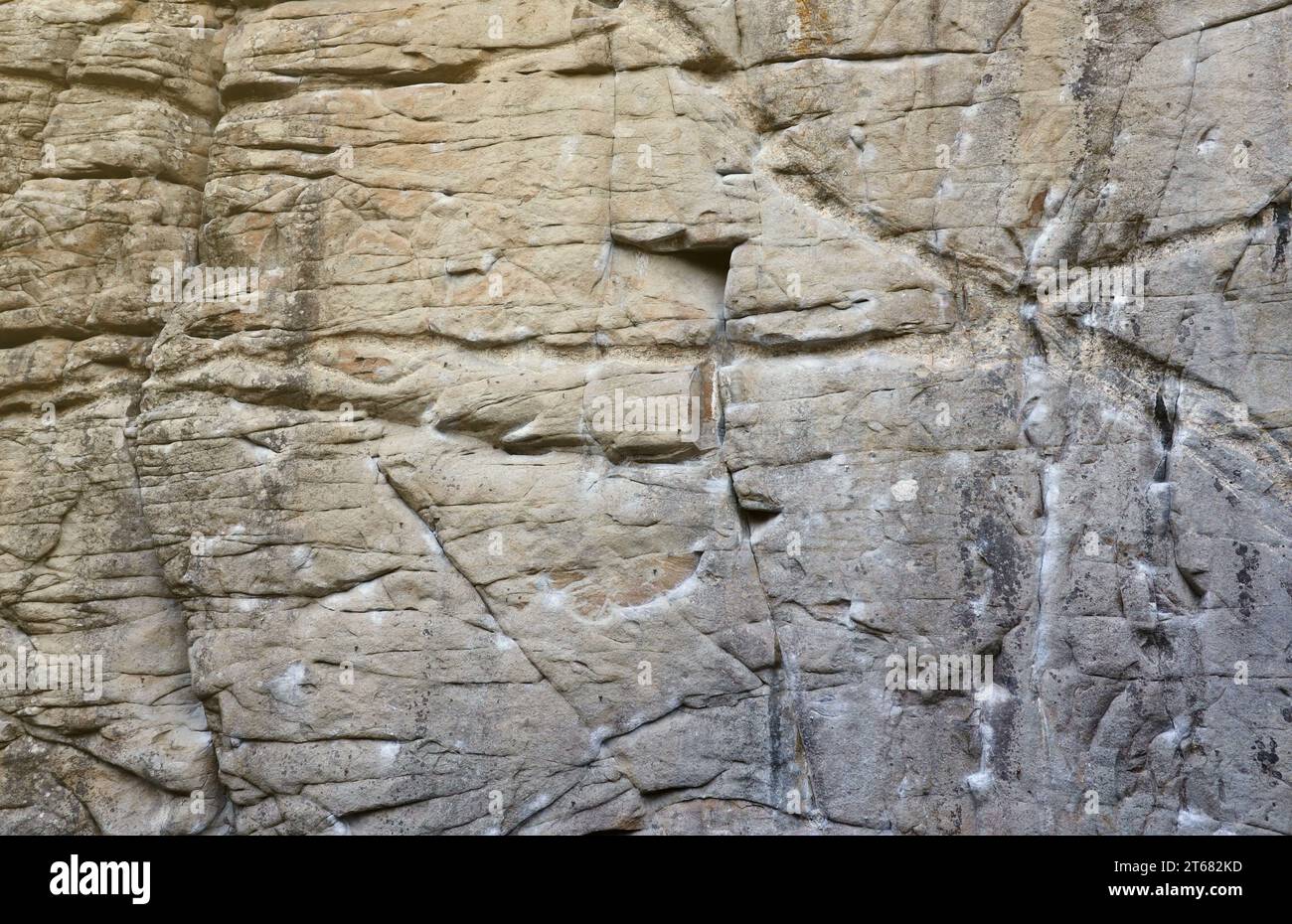 Light coarse natural rock stone background. Mining cliff rough front ...