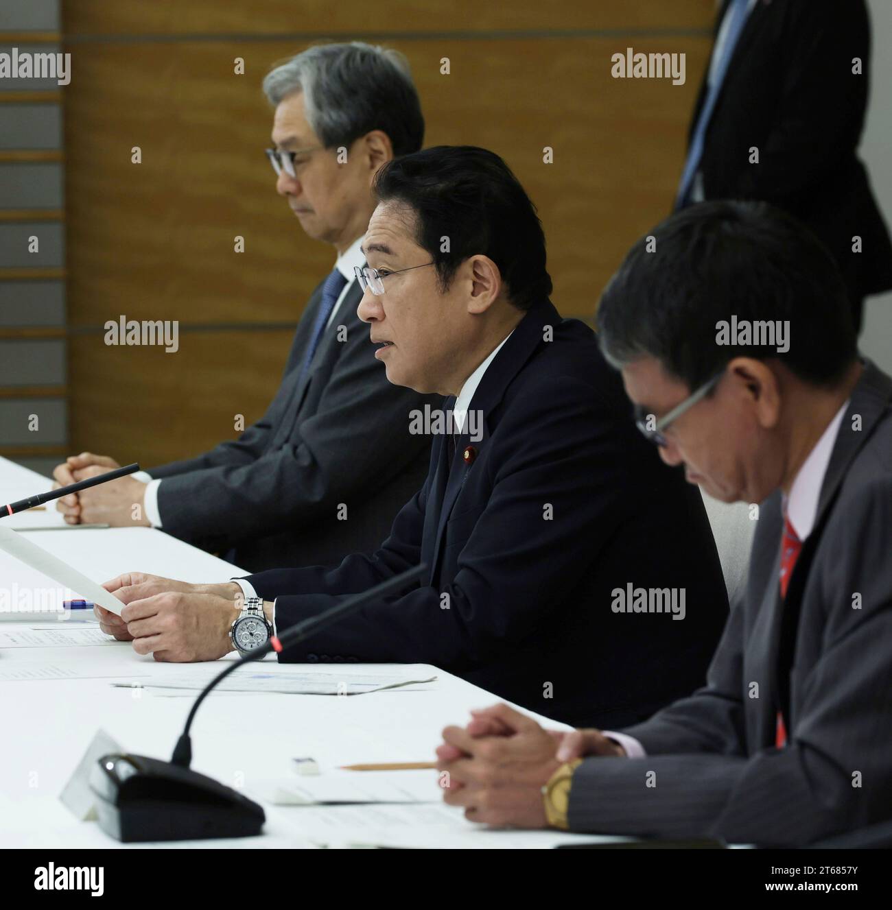 Japanese Prime Minister Fumio Kishida (C) attends My Number Information ...