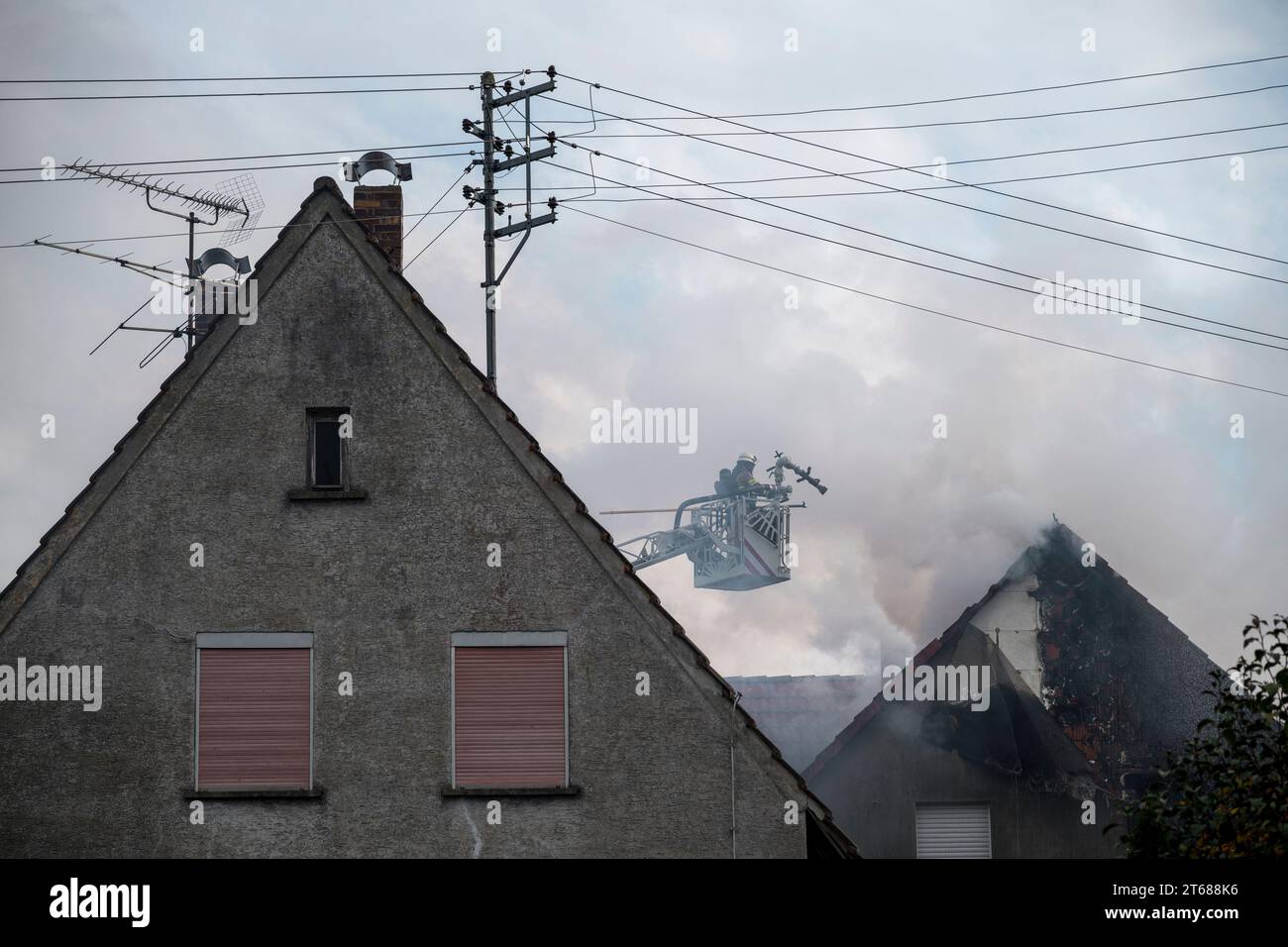Redwitz An Der Rodach, Germany. 09th Nov, 2023. A firefighter on a ...