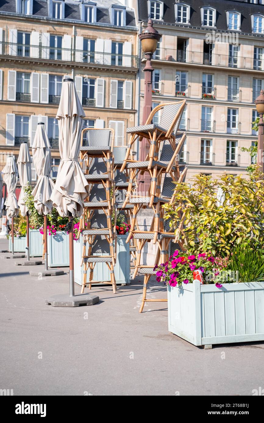 A collection of restaurant chairs on a bridge in Paris, France Stock ...