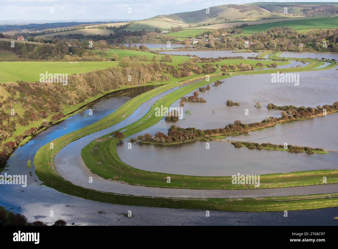 The Cuckmere river, East Sussex, in flood. The floodplain contains the ...