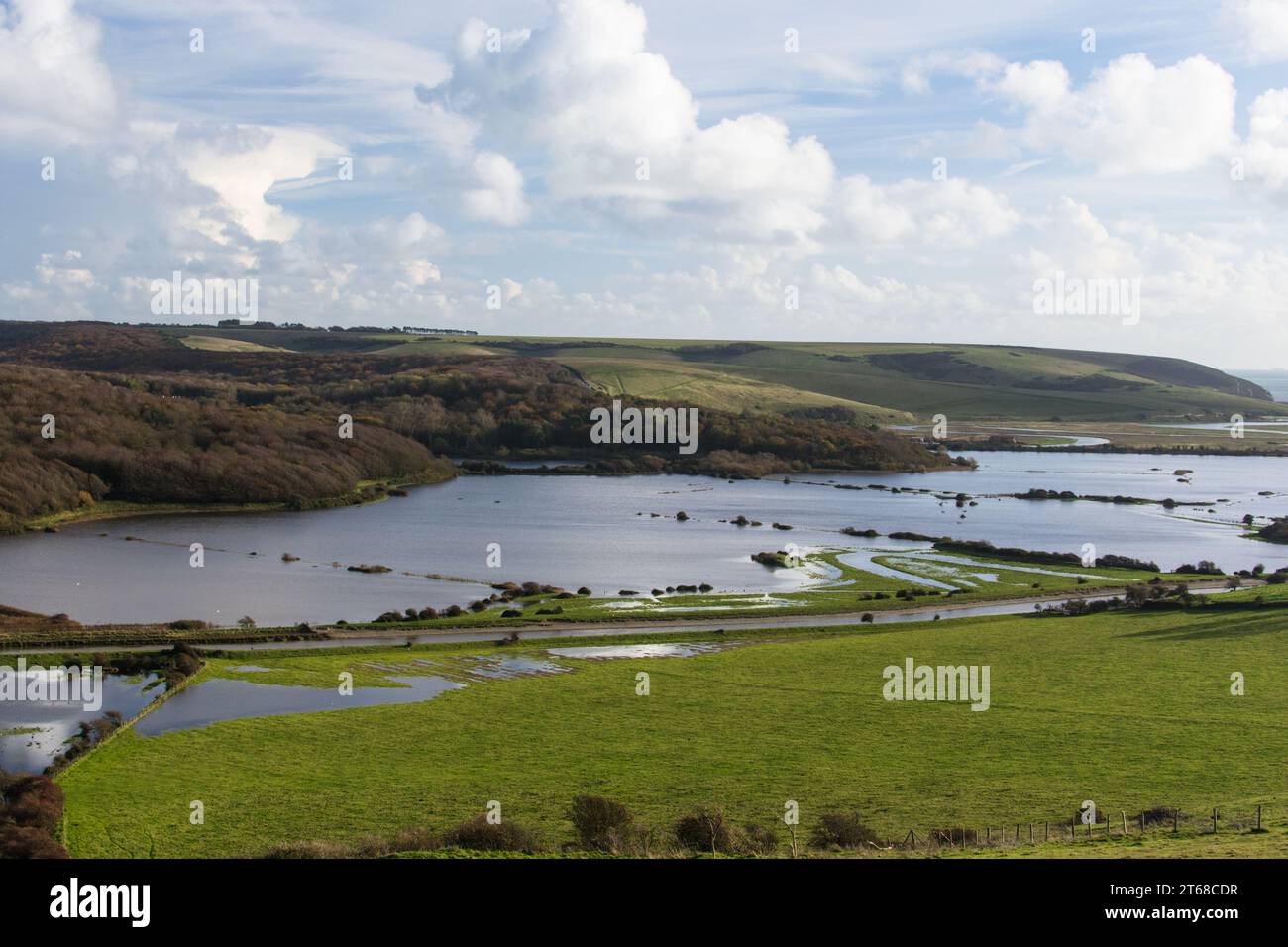 The Cuckmere river, East Sussex, in flood. The floodplain contains the ...