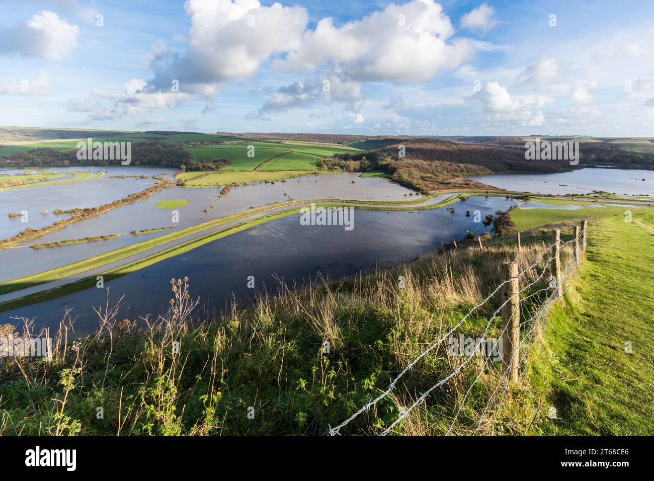 The Cuckmere river, East Sussex, in flood. The floodplain contains the ...