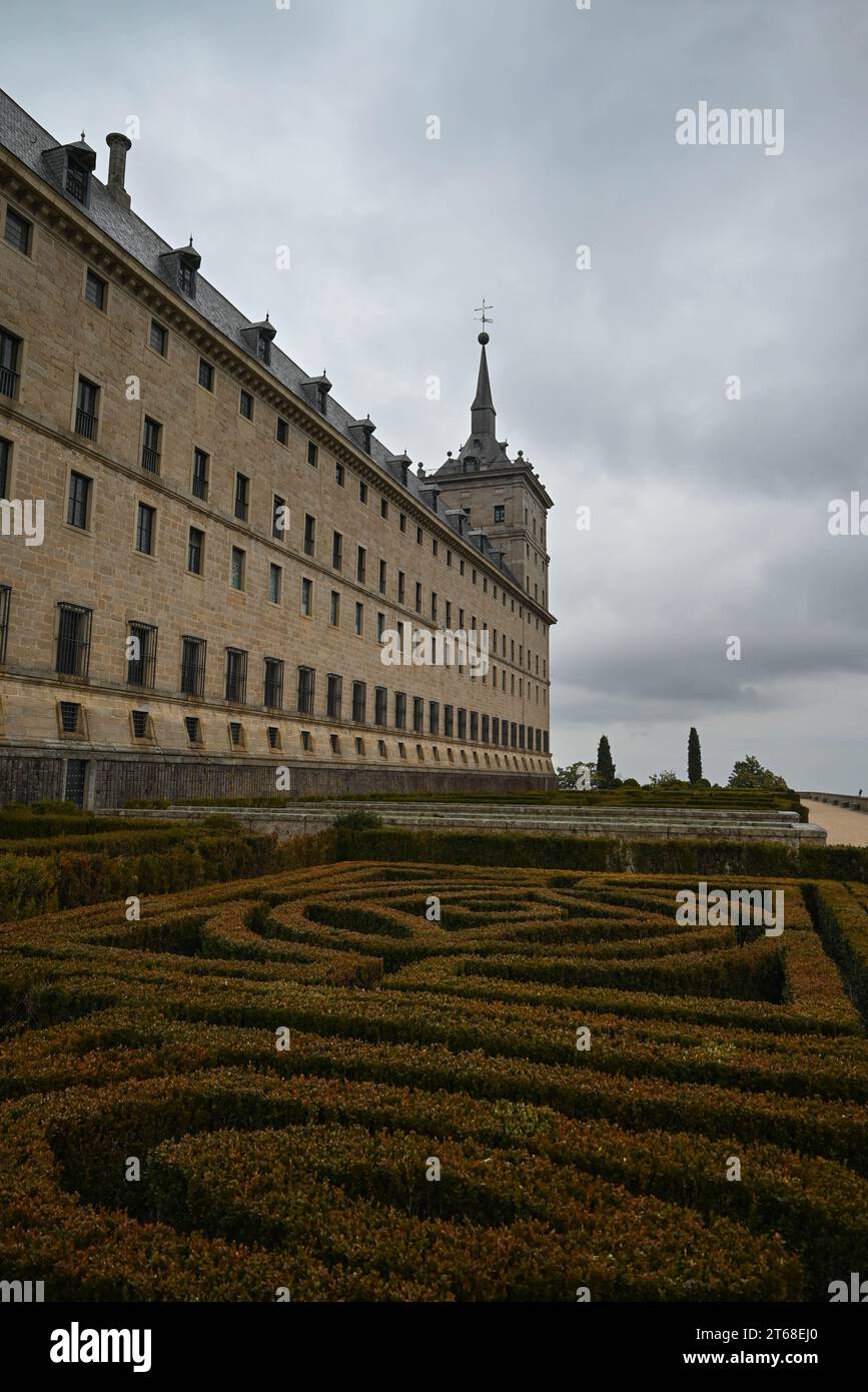 An image of a stone building surrounded by a winding maze path Stock ...