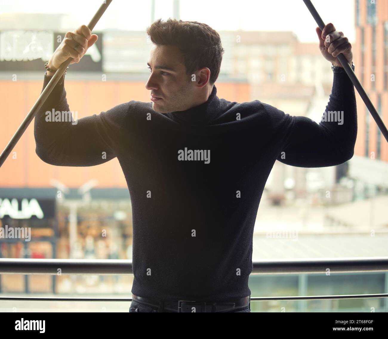 Person standing next to balcony hi-res stock photography and images - Alamy