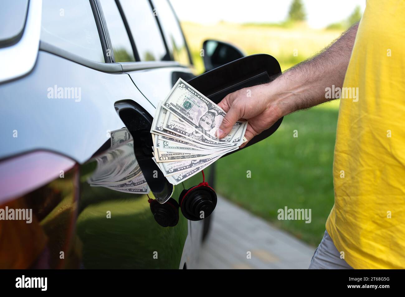 Money pouring in hi-res stock photography and images - Alamy