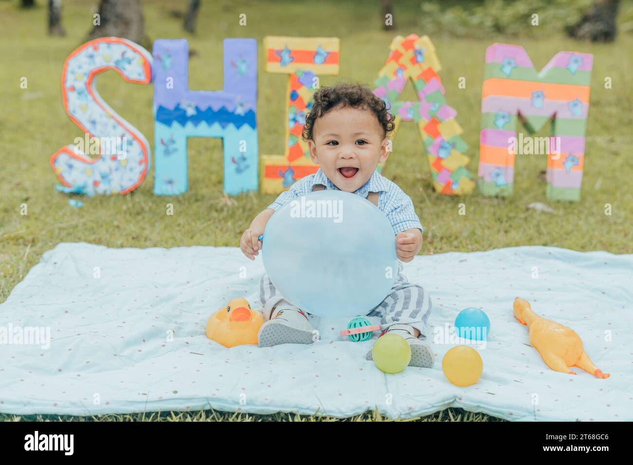 An adorable Filipino boy celebrates his first birthday in style Stock ...