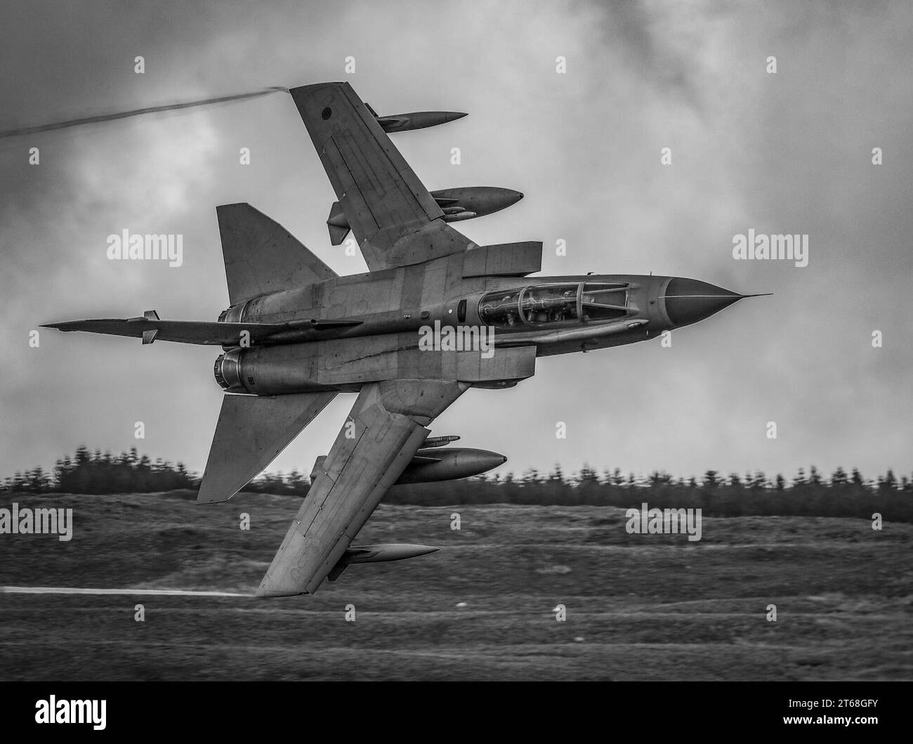 A medium-sized passenger jet is taking off from a commercial airport ...