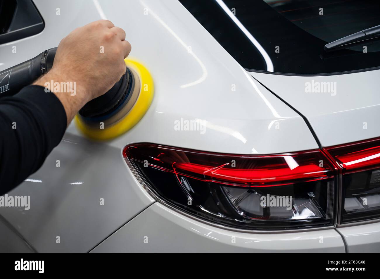 Process of polishing white car body surface using orbital polishing ...