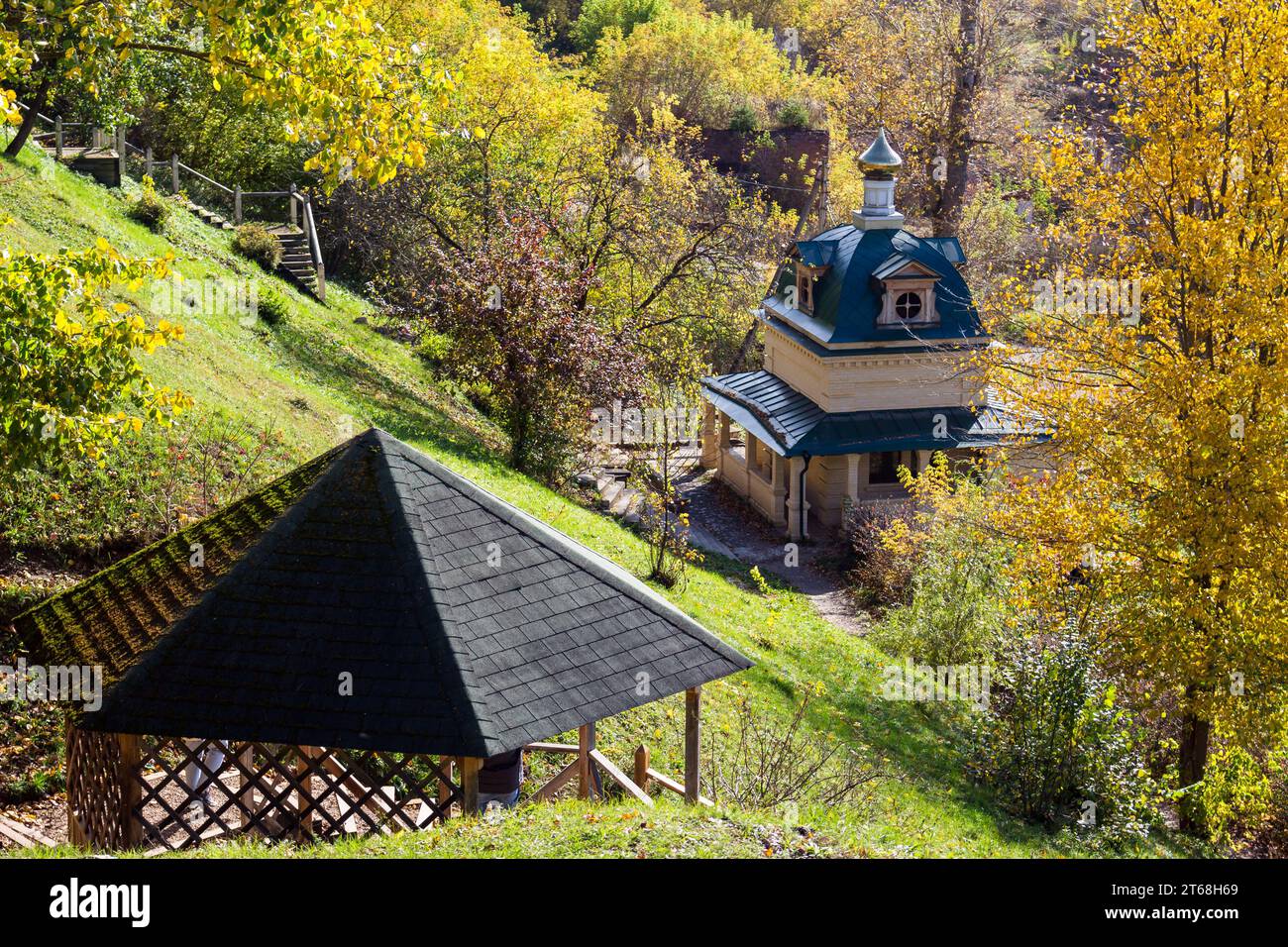 Beautiful park architecture built on a slope with gazebos and an ...