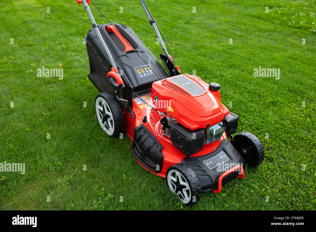 powerful lawn mower on the grass, top view Stock Photo - Alamy