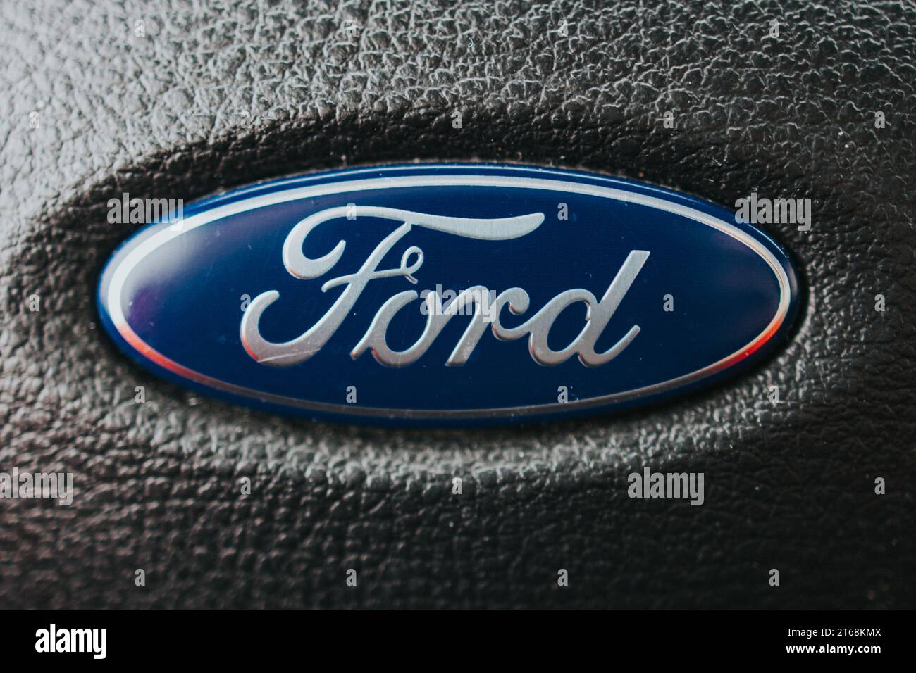 Blue Ford logo on steering wheel close up Stock Photo - Alamy
