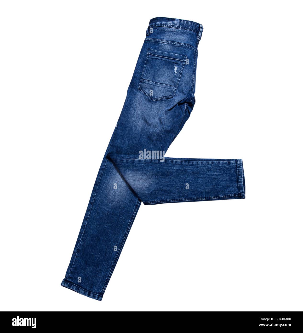 Stylish denim folded pants on white background close up, Denim close up ...
