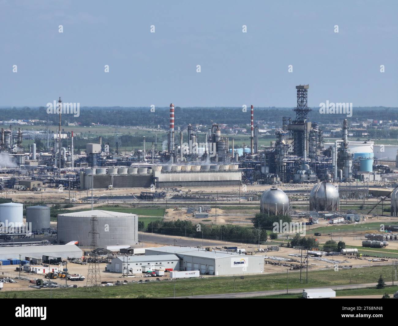 An industrial oil refinery facility situated in a remote rural ...