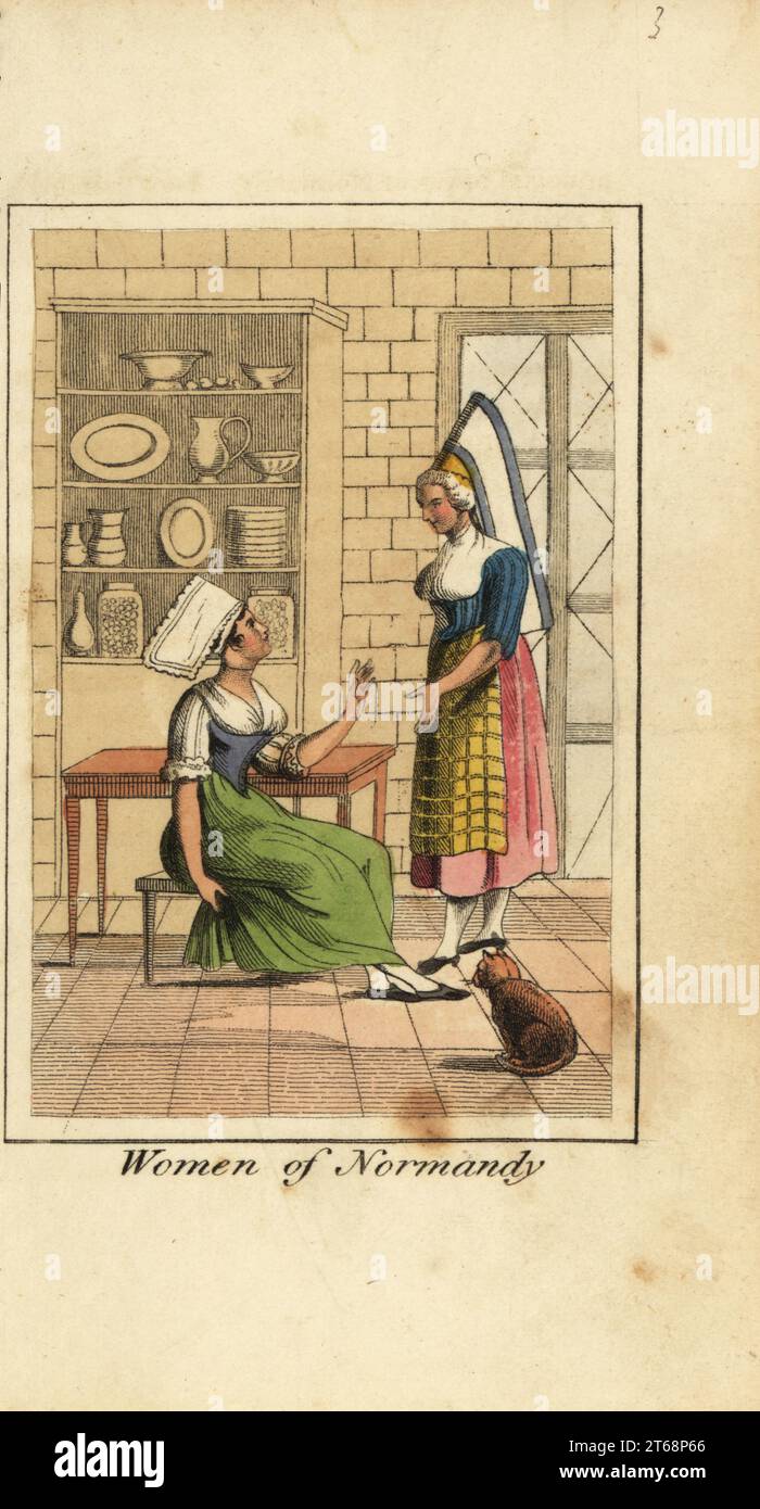 Women of Normandy, France, in a kitchen, 1818. They wear elaborate tall ...