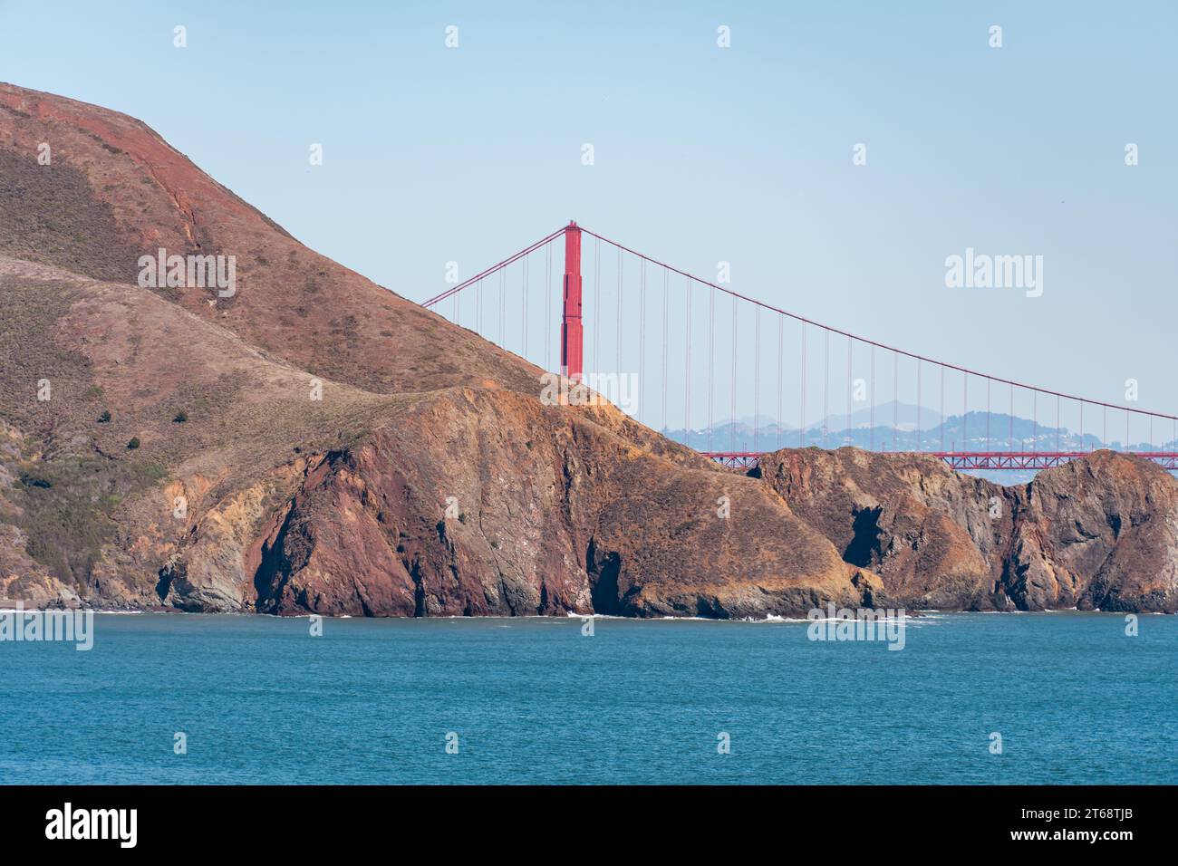 A white boat sails past the iconic Golden Gate Bridge in the San ...