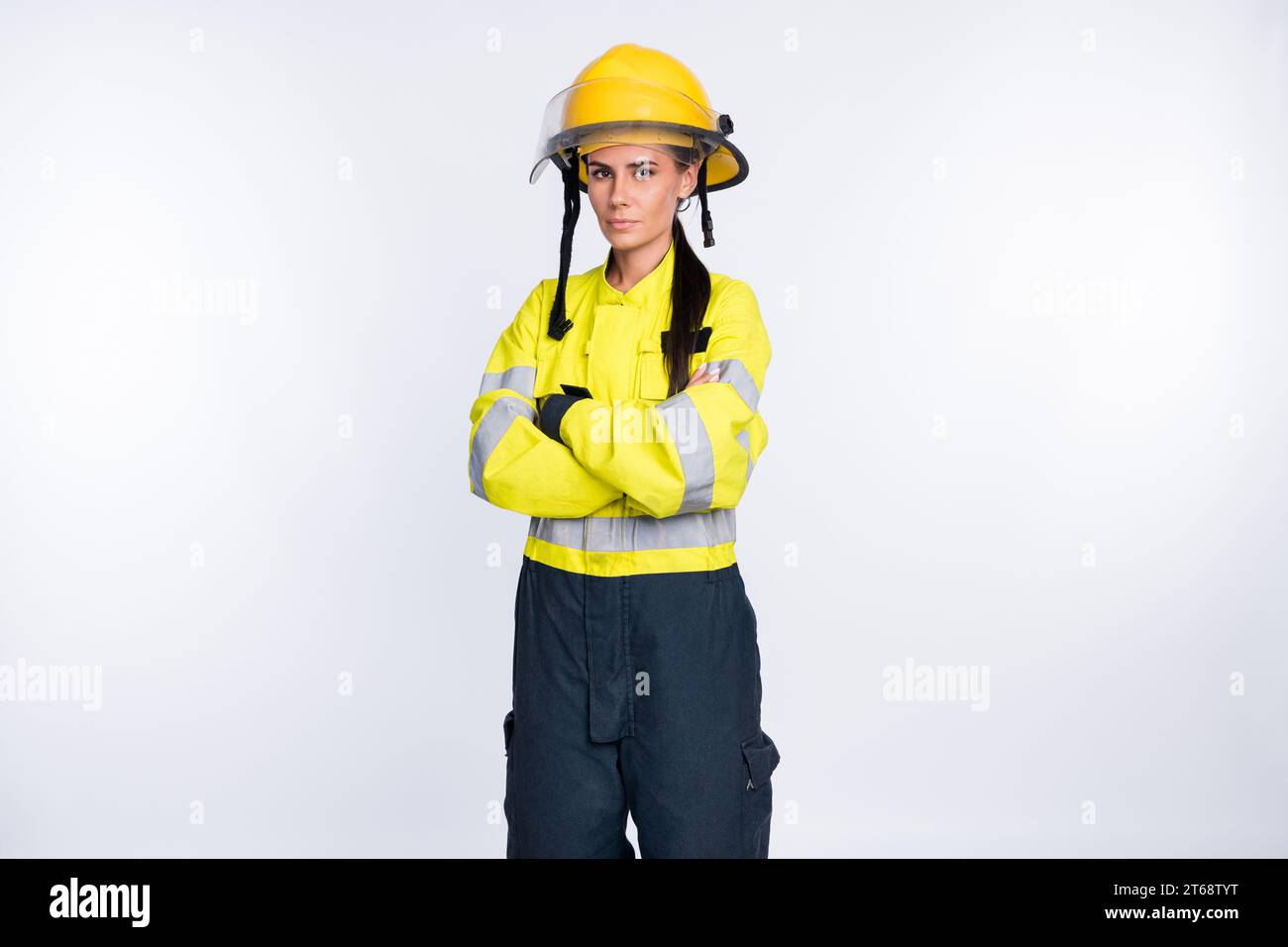 Photo of young attractive woman firefighter serious confident crossed ...