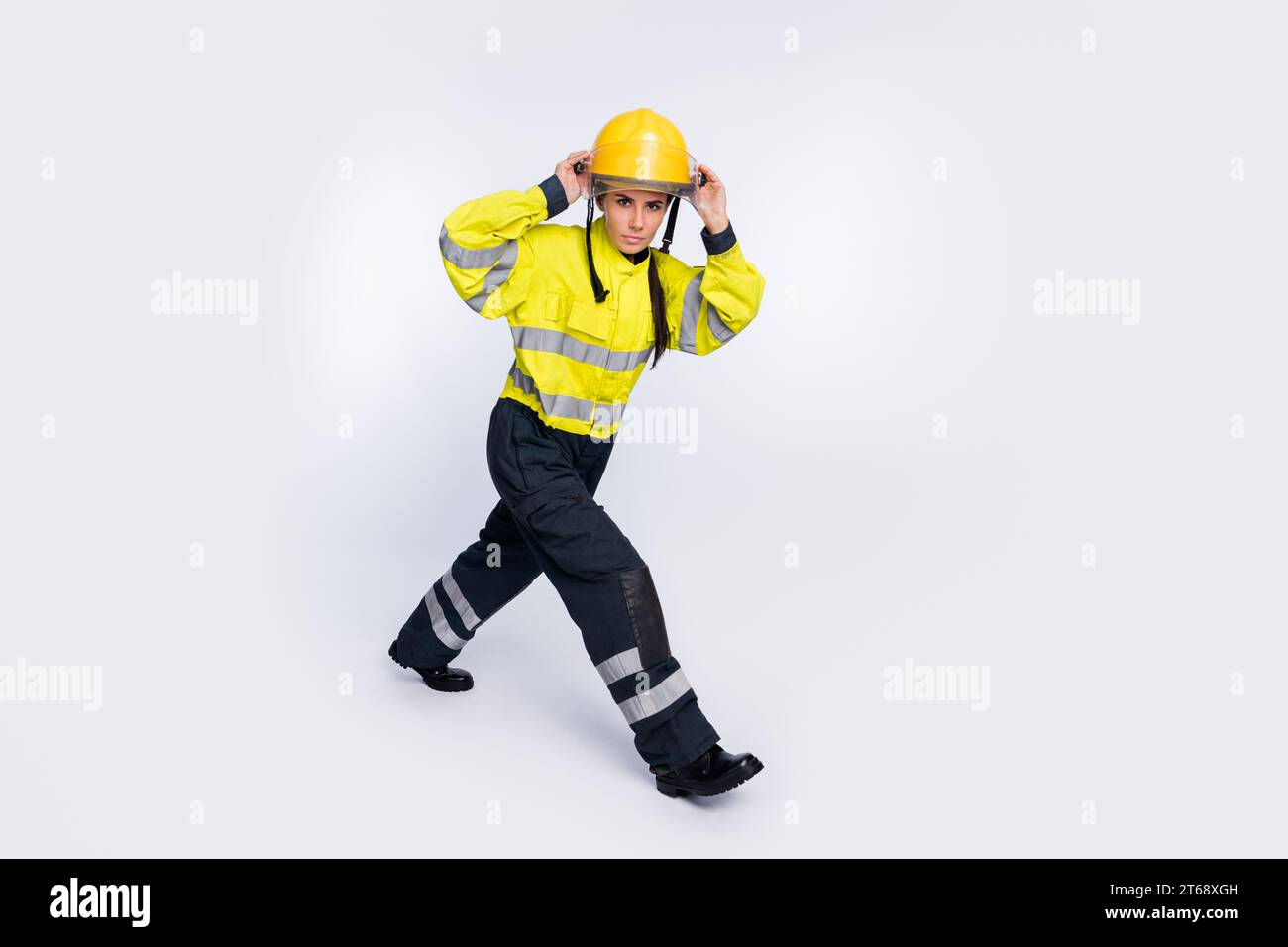 Full body profile side photo of young woman firefighter go run ...