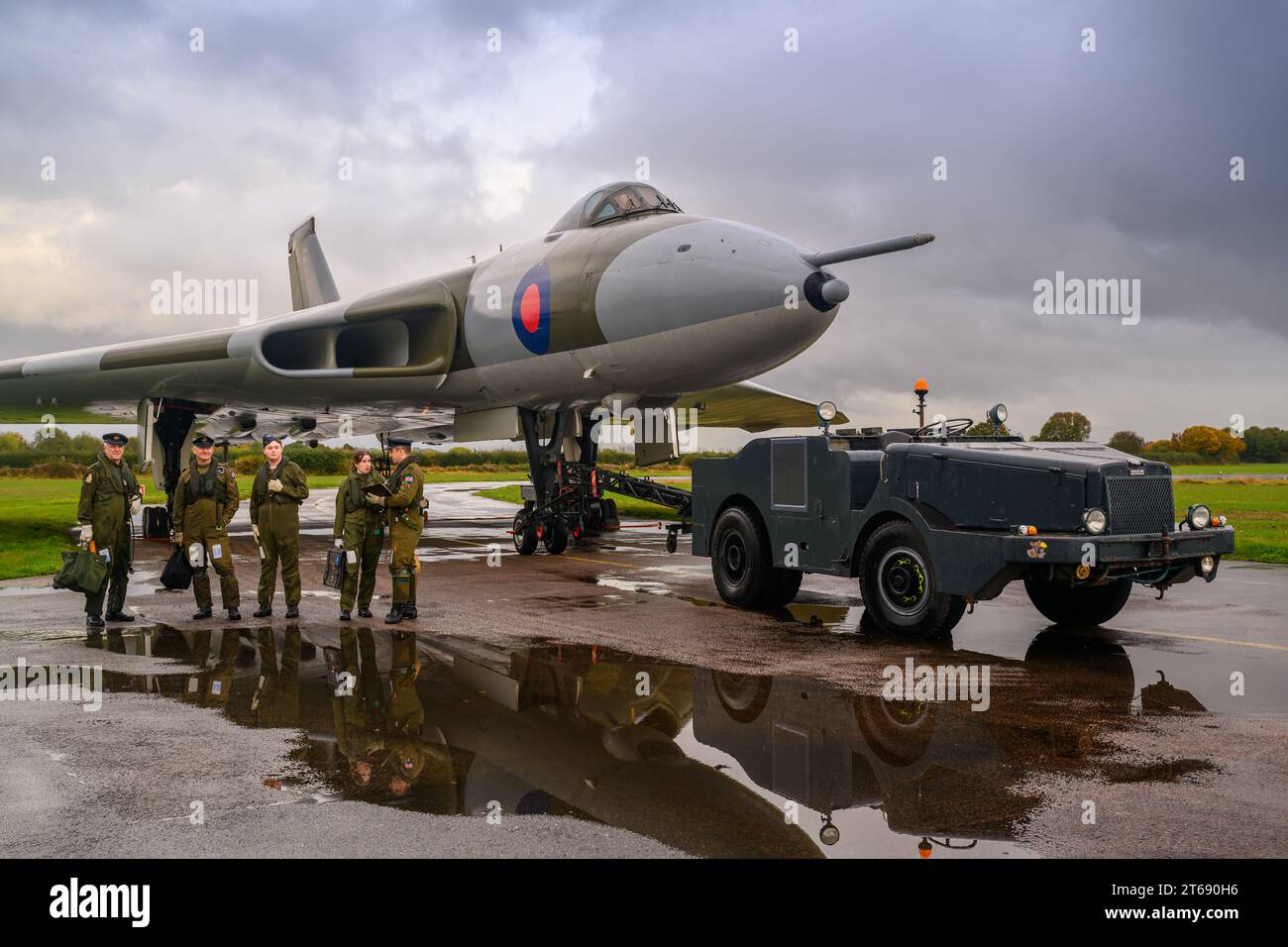 Avro Vulcan XM655 with a vintage Douglas Aircraft Tug Stock Photo - Alamy