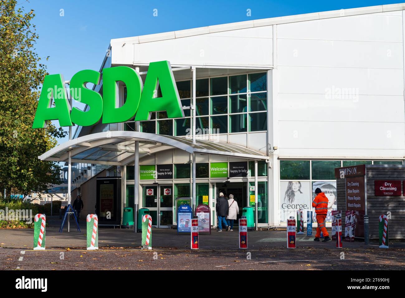 Shoppers enter the entrance of the Asda Superstore in Cannock, UK Stock ...