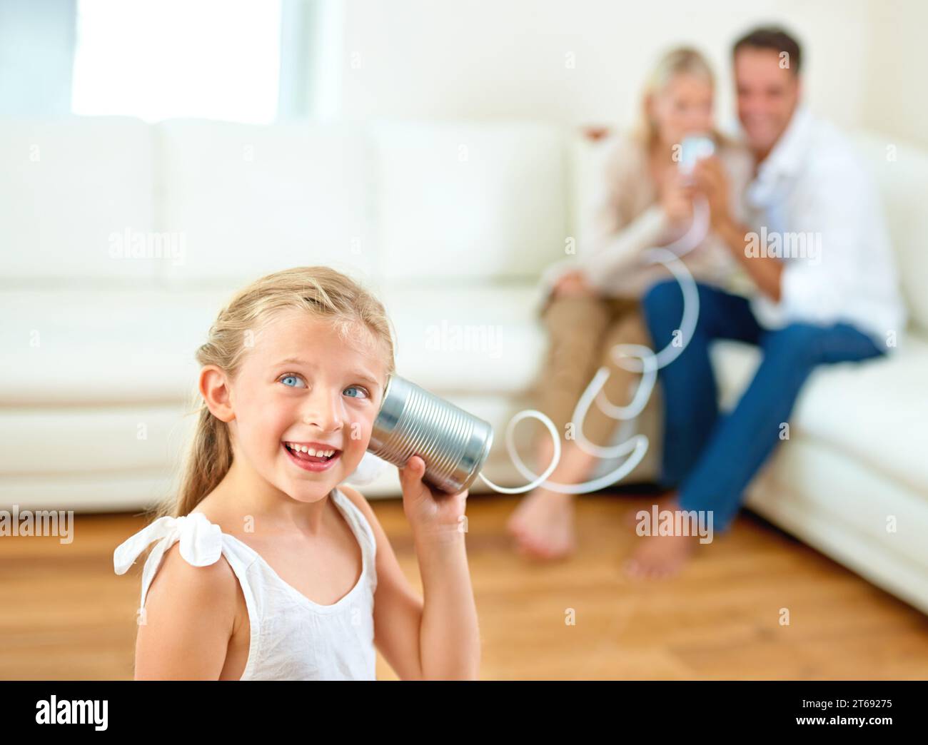 Thats so sweet. A little girl listening through a tin can connected to ...
