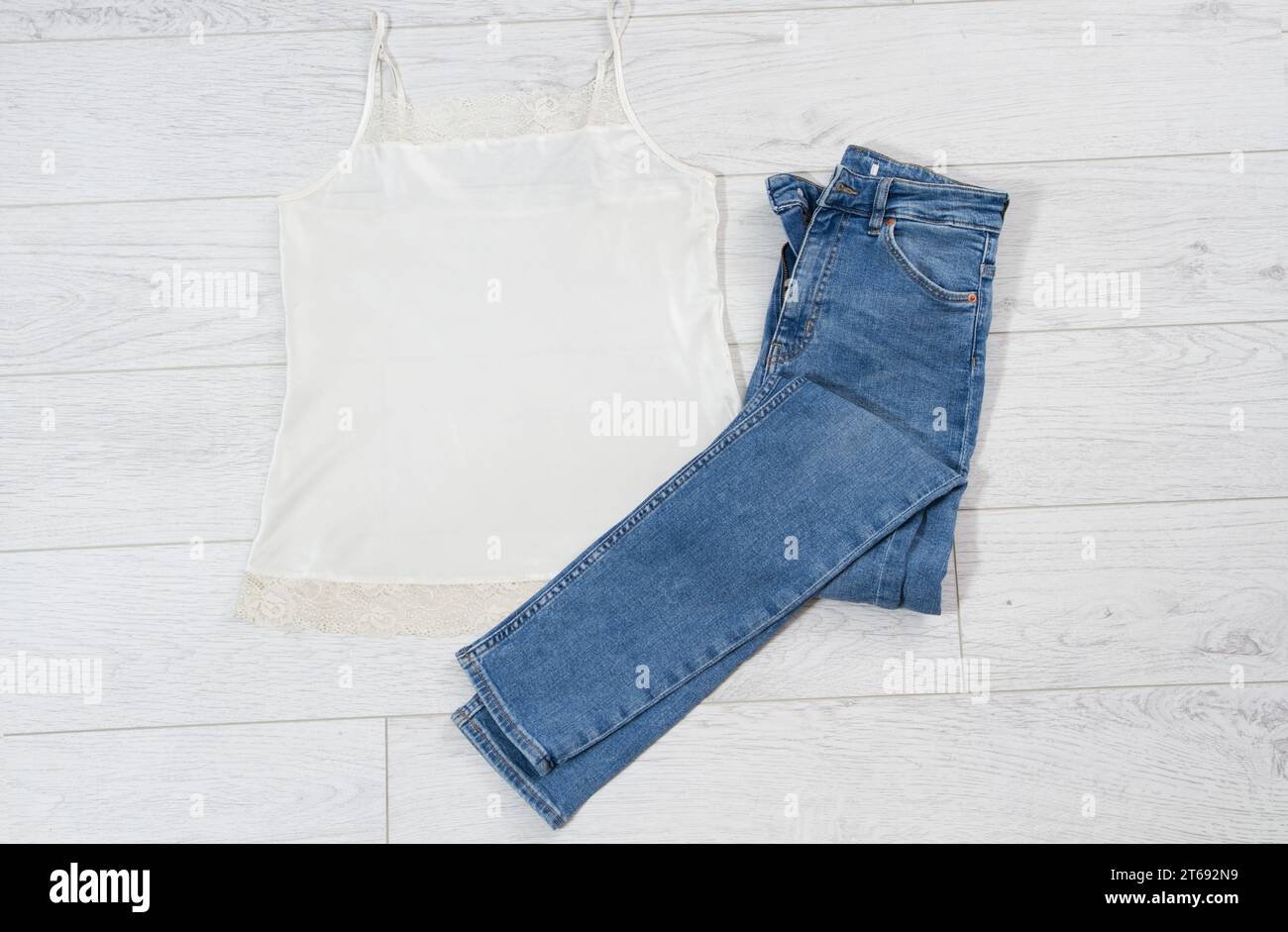 Folded denim on floor hi-res stock photography and images - Alamy