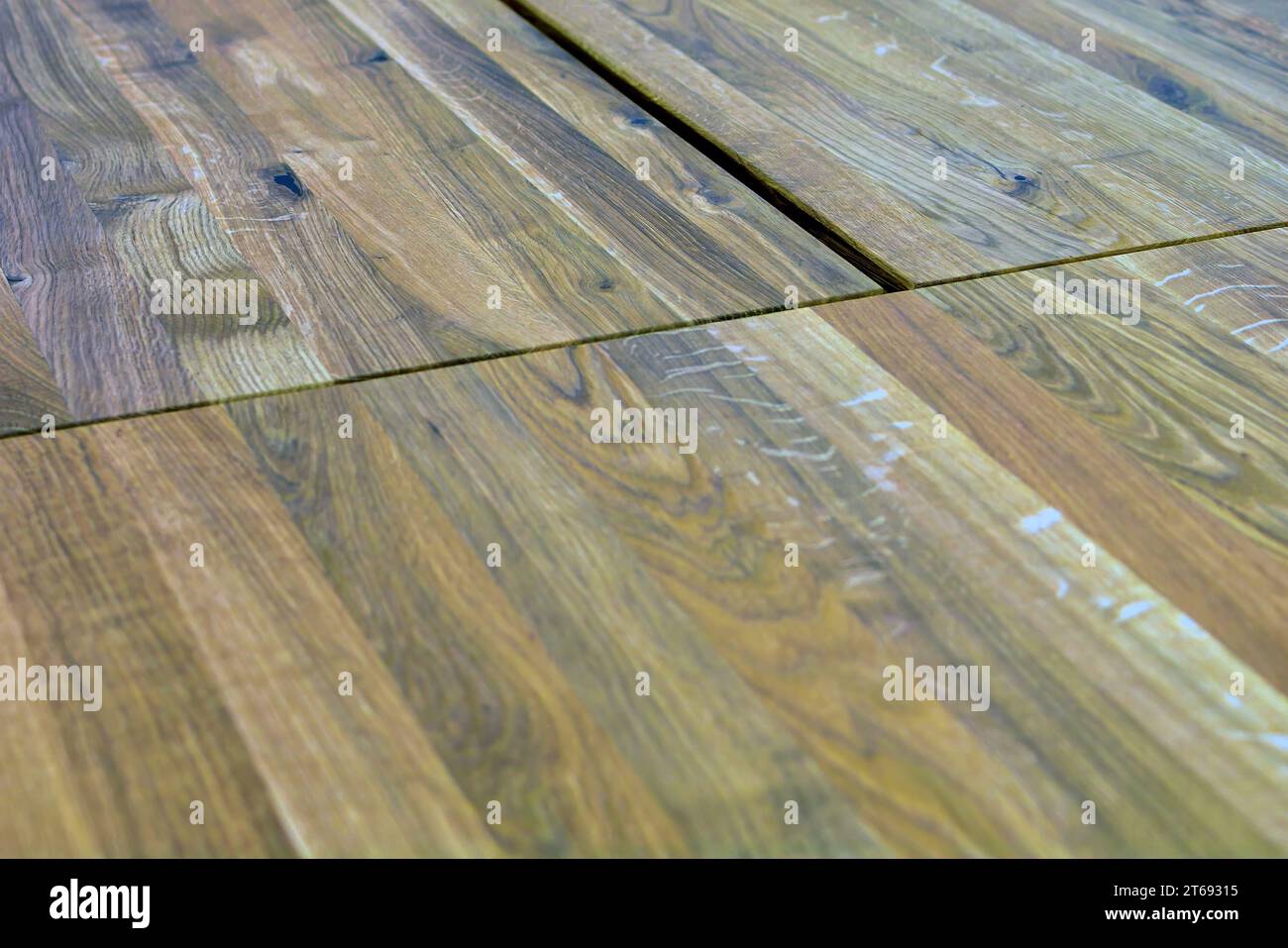 Wooden dinner table surface. Natural wood furniture close view ...