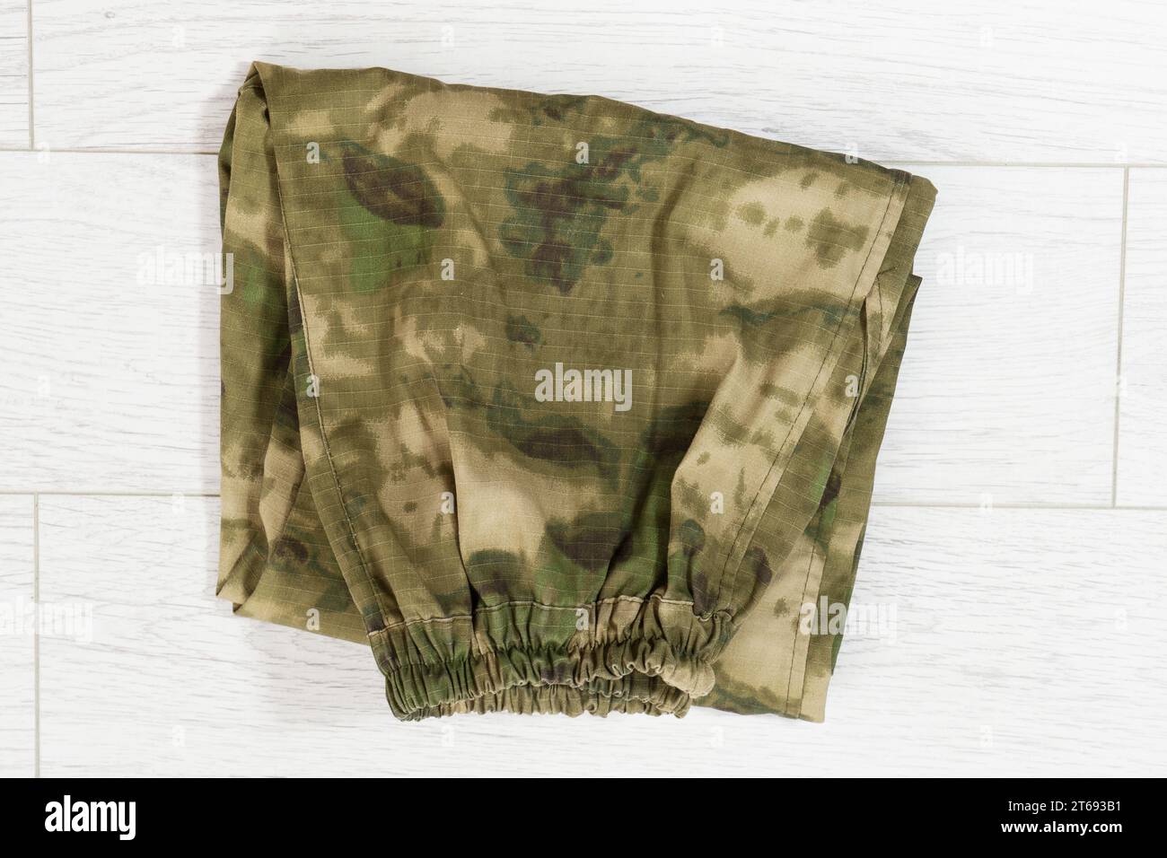Folded khaki military camouflage hi-res stock photography and images ...