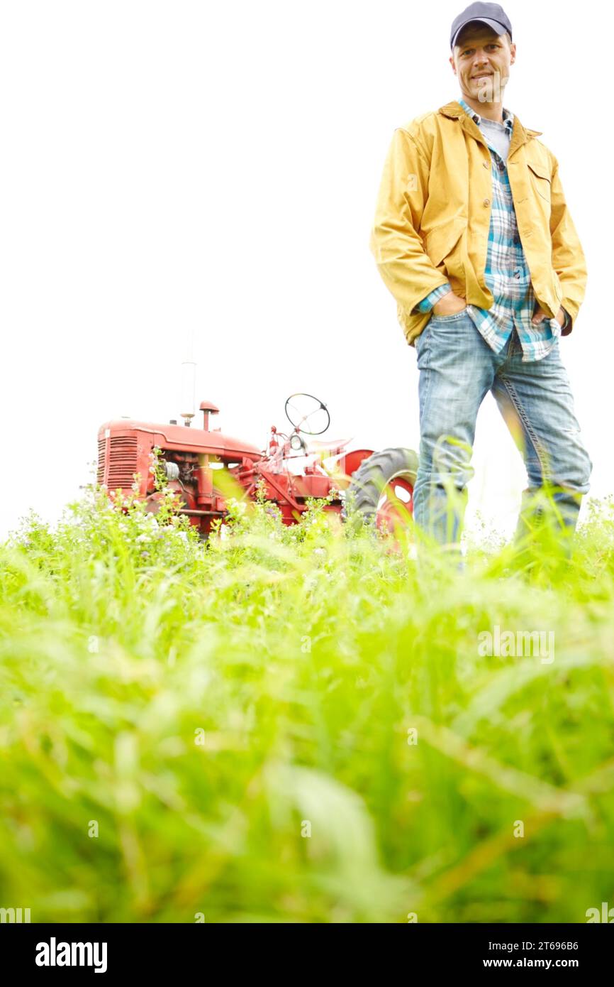 My average working day. Full length portrait of a farmer standing in a ...