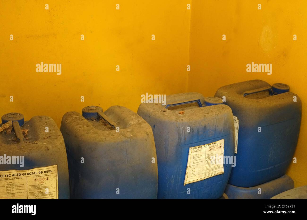 A old blue gallon of chemicals in a storage chemical room Stock Photo ...