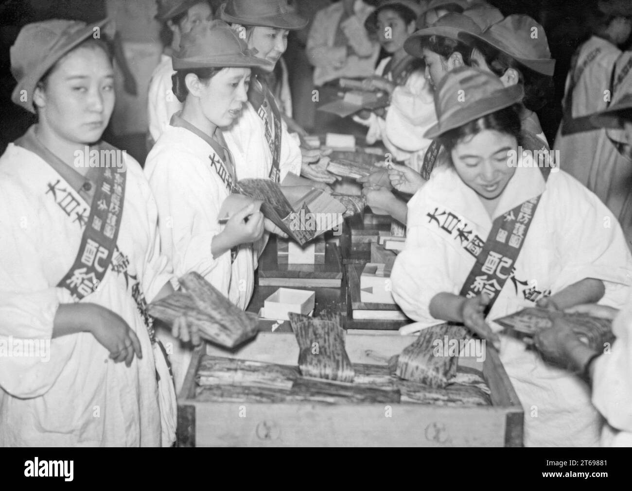 Women of a Japanese civil defense unit during an air-raid drill in ...