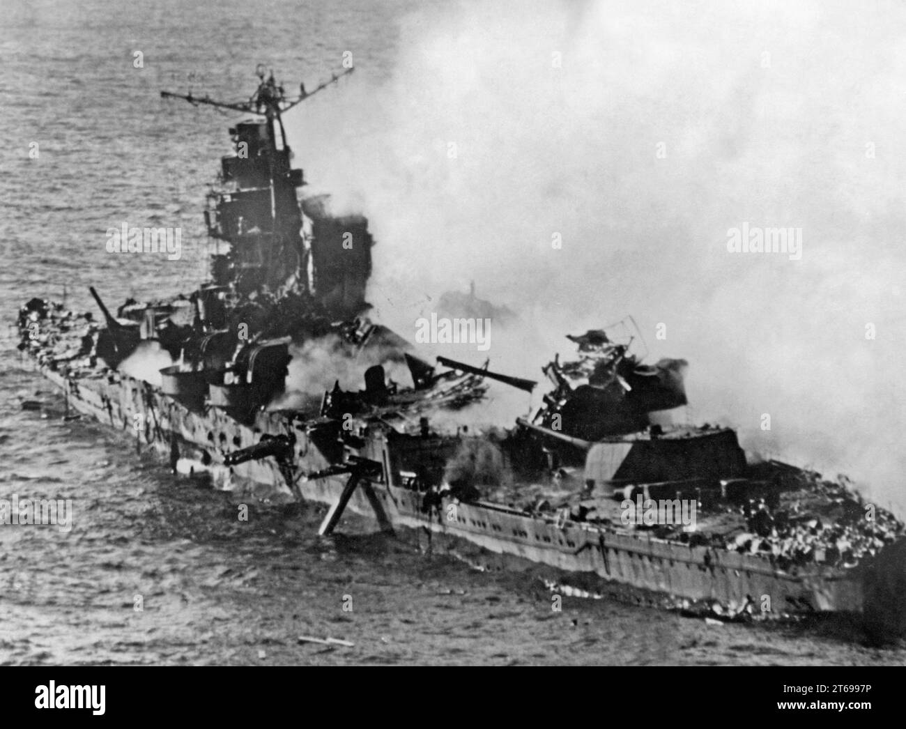 Japanese warship, the cruiser Mikuma, badly damaged by attacks from the ...