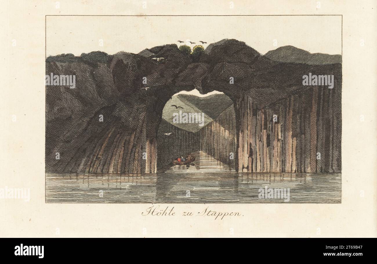 Cave with columnar cliffs and natural rock arch near Stappen, Iceland ...