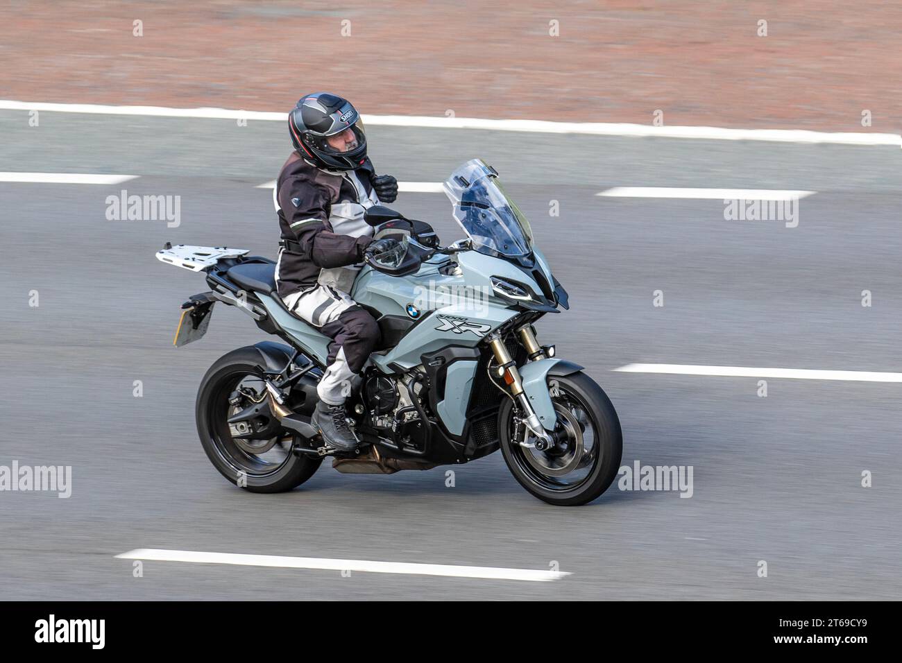 BMW S1000 XR Motorbike rider; two-wheeled transport, grey motorcycles ...